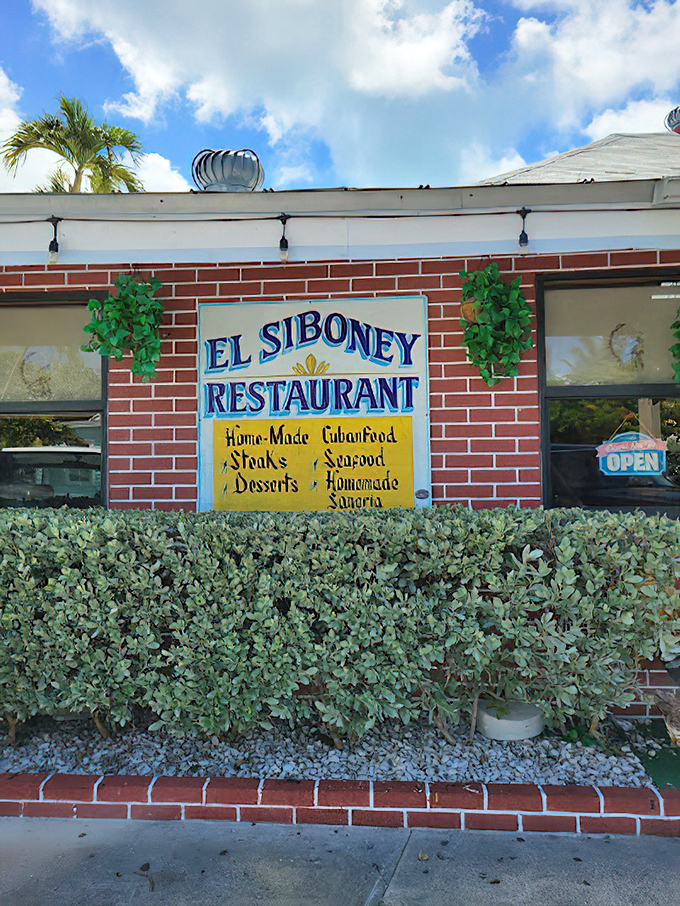 The sign proudly announces "Home-Made Cuban Food" alongside other temptations. Like a billboard for happiness that actually delivers on its promises.