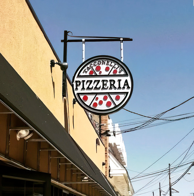 The sign that signals salvation for the pizza-obsessed. Like a lighthouse guiding hungry souls to the shore of deliciousness.