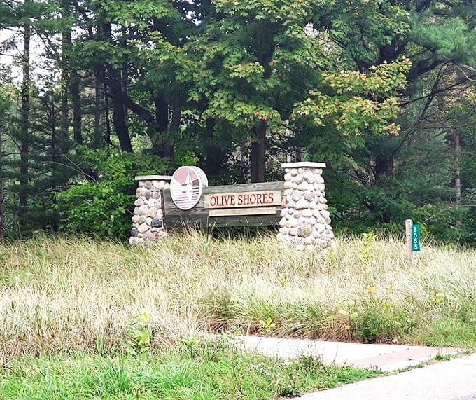 The entrance sign that promises little but delivers everything&mdash;nature's version of underpromising and overdelivering.