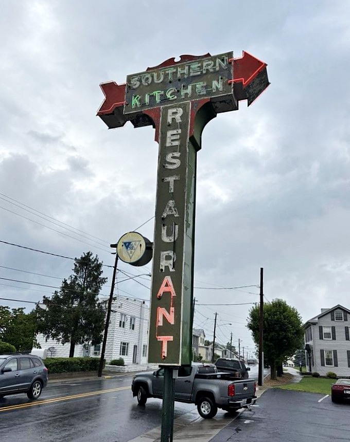 That vintage neon sign has guided hungry travelers for generations. It's not just advertising&mdash;it's a beacon of culinary hope.