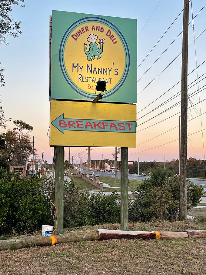 The roadside sign stands as a beacon of breakfast hope, guiding hungry travelers toward a meal that feels like coming home.