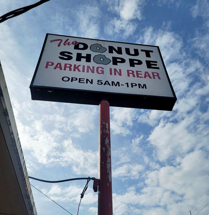 The sign tells you everything you need to know: arrive early (5AM-1PM) or risk heartbreak. Some warnings are more important than others.