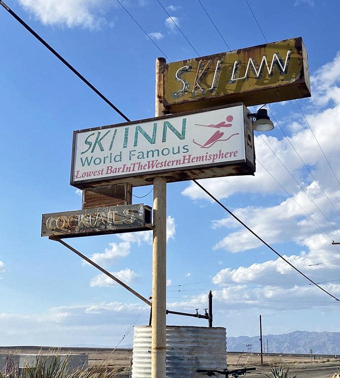 The sign that launched a thousand road trips. Standing tall against the desert sky, it beckons hungry travelers with a promise of "world famous" experiences below sea level.