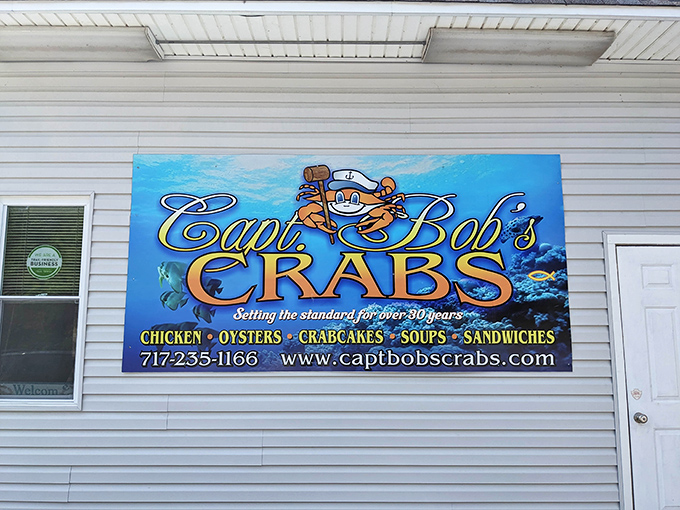 Bold blue lettering and a smiling crab mascot declare "Setting the standard," a claim this Railroad restaurant backs up with every platter.