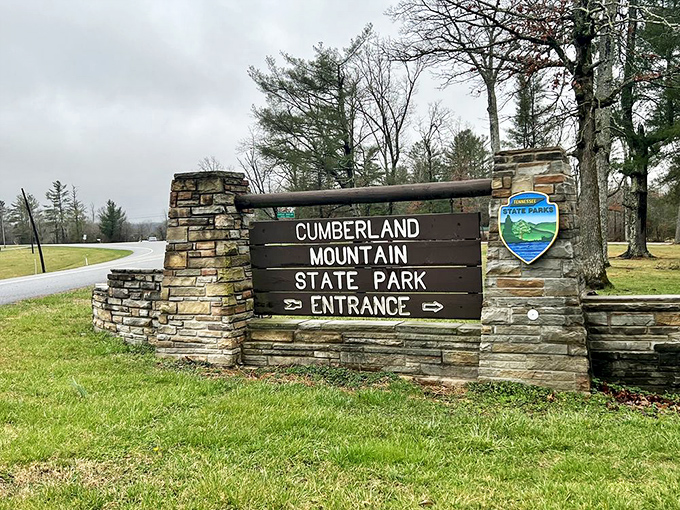 Every great adventure begins with a sign pointing the way, and Cumberland Mountain's welcome is carved in stone. 