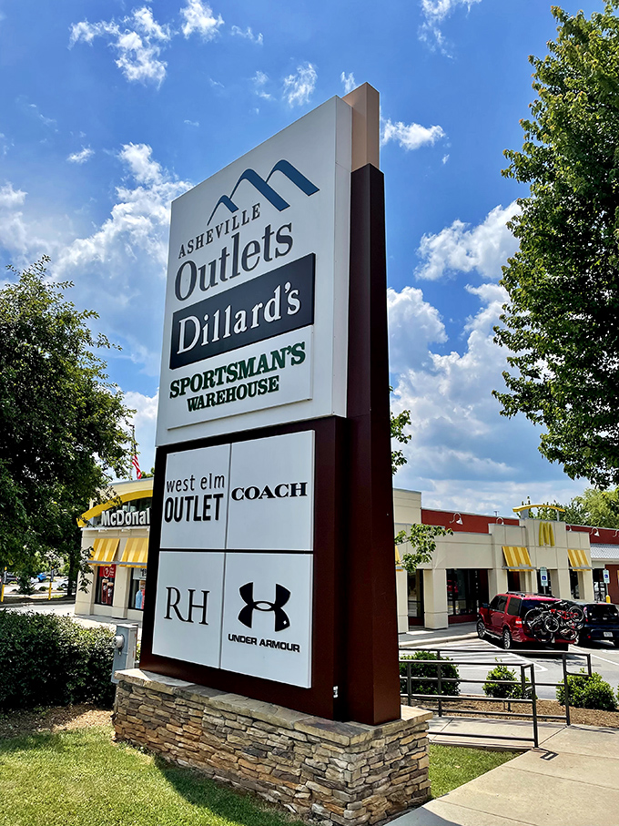 The gateway to bargain paradise. This sign doesn't just mark an entrance&mdash;it's the starting line for your shopping marathon.