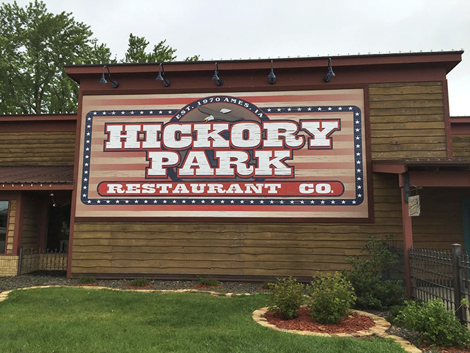 The marquee sign shines like Broadway for BBQ, announcing your arrival at Iowa's temple of smoked meat magic.