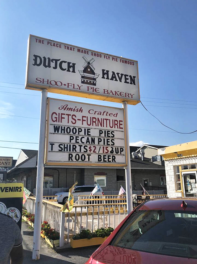 The roadside sign proudly announces "THE PLACE THAT MADE SHOO FLY PIE FAMOUS"&mdash;a bold claim backed by generations of satisfied sweet tooths.