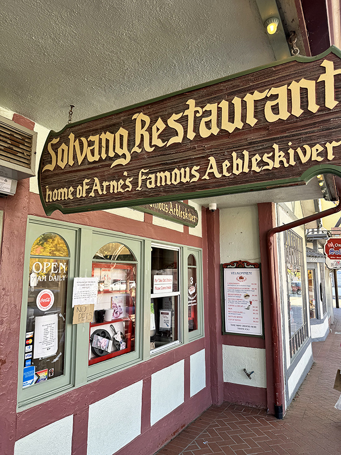 The sign that's launched a thousand breakfast pilgrimages – "Home of Arne's Famous Aebleskiver" indeed.