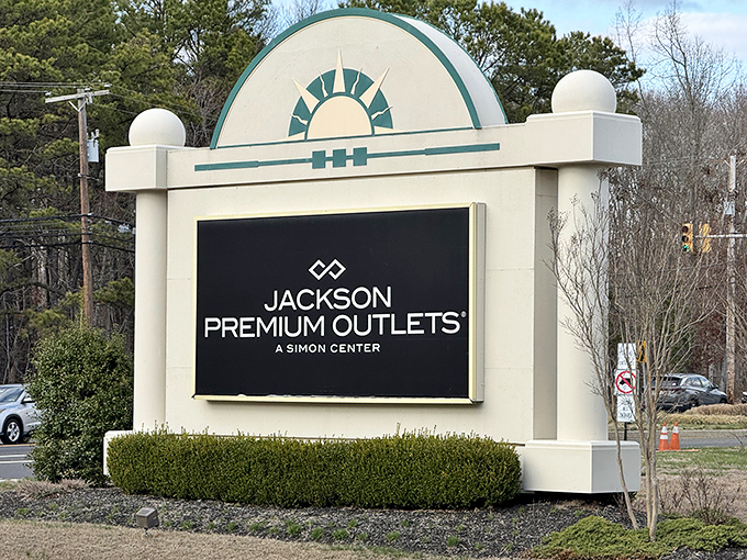 The welcome sign stands proud, officially marking your arrival at a place where your wallet fears to tread but your heart absolutely insists on going.