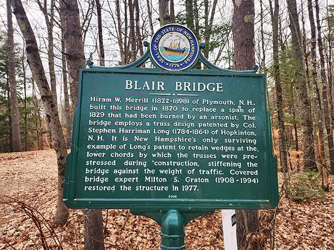 This historical marker reveals the bridge's remarkable story of resilience through fires, floods, and nearly 150 years of New Hampshire weather.