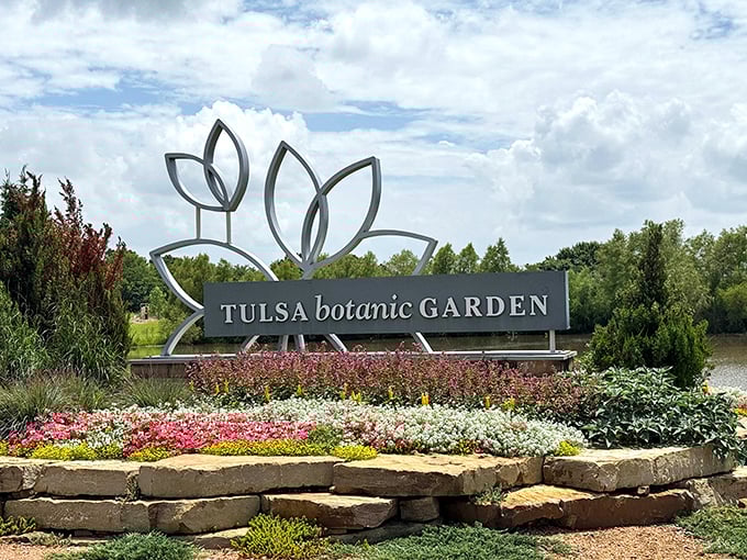 The entrance sign welcomes visitors with elegant simplicity, promising botanical adventures that deliver far beyond expectations.