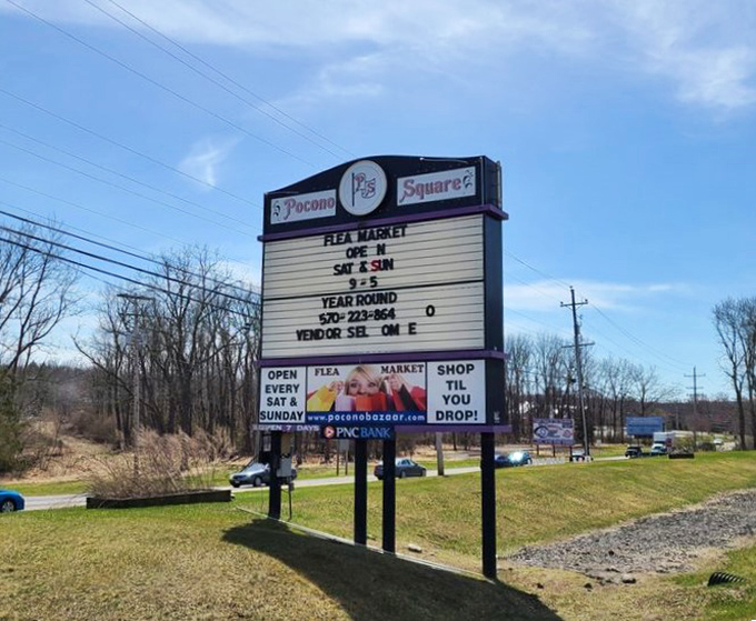 The roadside sign announces operating hours with old-school charm that GPS directions could never quite capture properly.