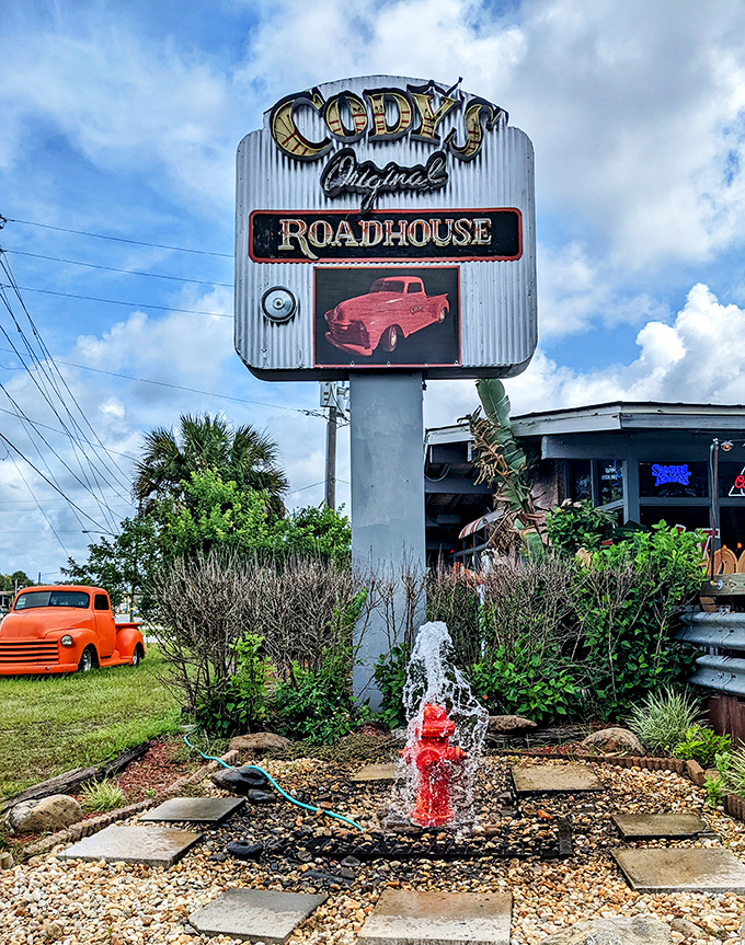 The iconic sign stands tall against Florida's blue sky, a beacon for hungry travelers and locals alike seeking honest-to-goodness roadhouse fare.