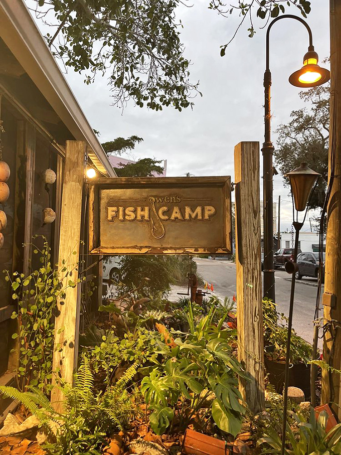 The weathered wooden sign stands as a beacon for seafood pilgrims, promising authentic flavors without pretension&mdash;a rare find in today's Instagram-obsessed food world.