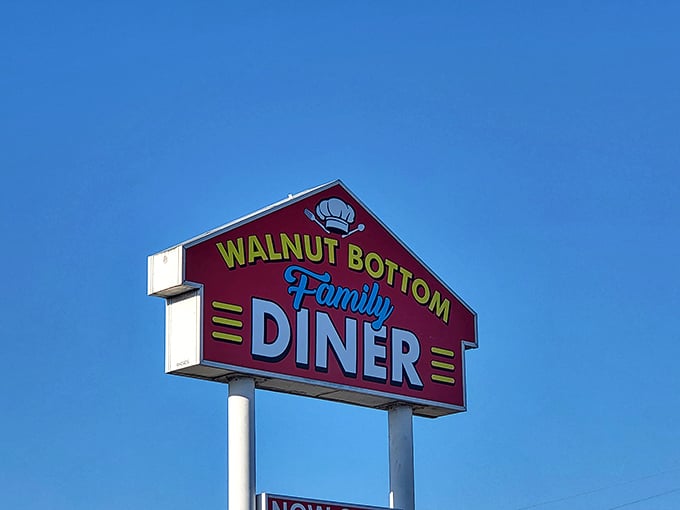 The beacon of hope for hungry travelers &ndash; that iconic red sign promising home-style cooking and zero pretension just ahead.