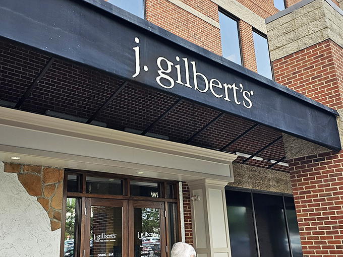 The signage promises exactly what awaits inside: wood-fired excellence that's worth traveling for, planning for, and dreaming about between visits.