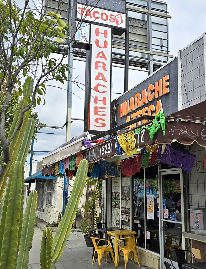 The vertical signage proudly announces "HUARACHES" to the neighborhood, like a delicious exclamation point on York Boulevard.