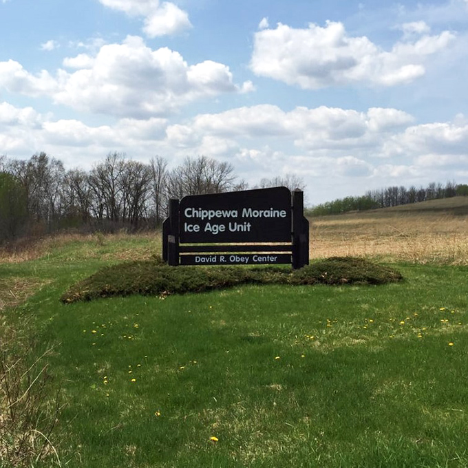 The official welcome mat to 3,700 acres of glacial wonder. This sign marks the boundary between everyday life and extraordinary natural escape.