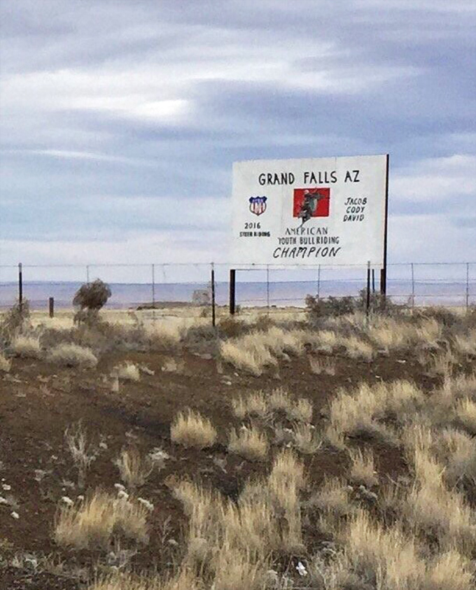 The journey's first landmark appears! This unassuming sign marks the entrance to one of Arizona's most spectacular natural phenomena.