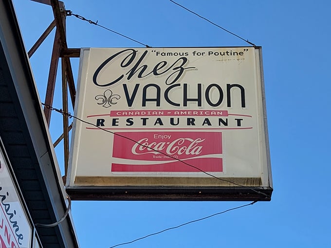 The vintage sign proclaims "Canadian-American Restaurant"&mdash;a delicious diplomatic alliance that benefits your taste buds immensely.
