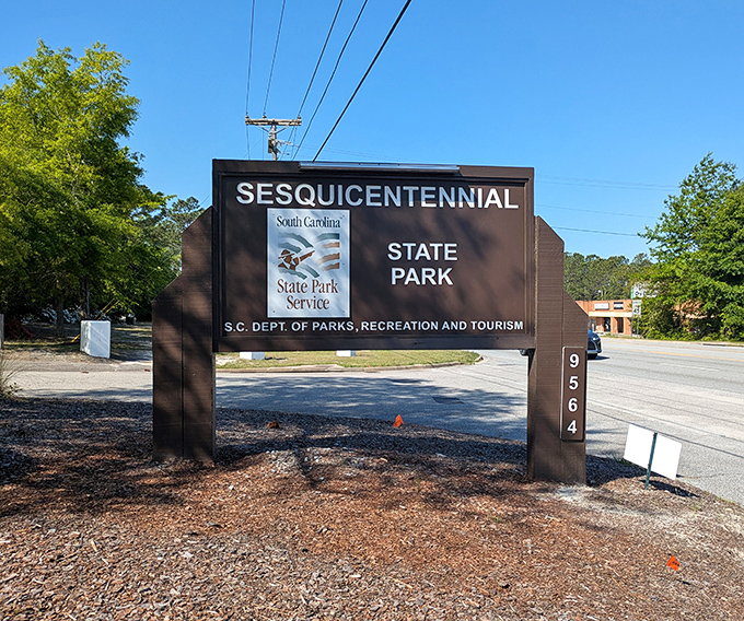 The entrance sign that promises adventure—where that hard-to-pronounce name leads to easy-to-love experiences.