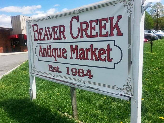 The roadside sign announcing your arrival at a treasure hunter's paradise since 1984. Like a vintage wine, this market has only improved with age.