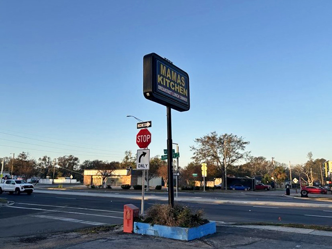 The roadside sign stands tall against the Florida sky, guiding hungry travelers to their breakfast destiny on Dale Mabry Highway.