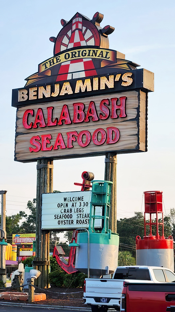 The iconic Benjamin's sign stands tall, a neon promise of seafood abundance that's been fulfilling Myrtle Beach dreams for decades.