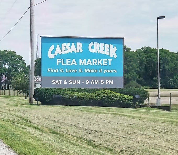 The sign says it all: "Find it. Love it. Make it yours." The flea market trinity that turns Saturday shopping into a spiritual experience.