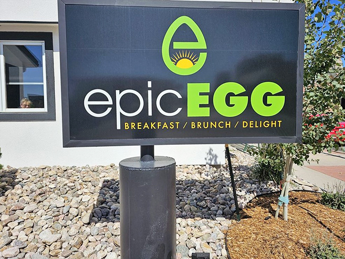 The Epic Egg sign stands as a beacon of breakfast hope, its sunny logo promising that yes, your morning is about to get significantly better.