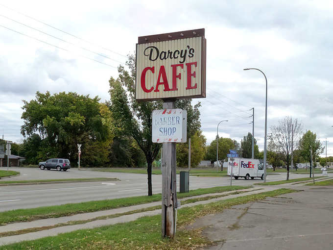 The vintage roadside sign beckoning hungry travelers like a beacon of hope in a world of disappointing breakfast chains.