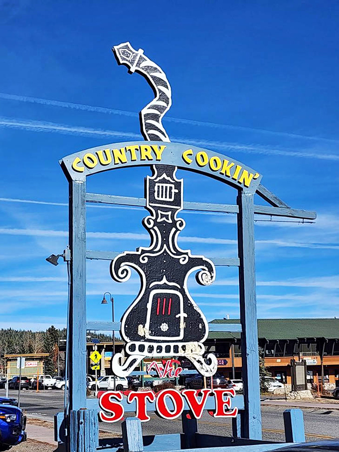 The iconic sign stands tall against Mammoth's blue sky, a quirky landmark that's guided hungry travelers to breakfast salvation for generations.