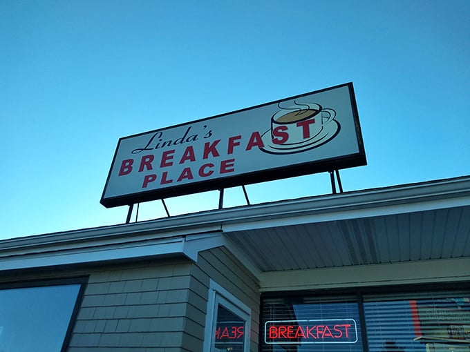 Linda's iconic sign glows against the New Hampshire sky &ndash; a beacon of breakfast hope in a world of mediocre morning meals.