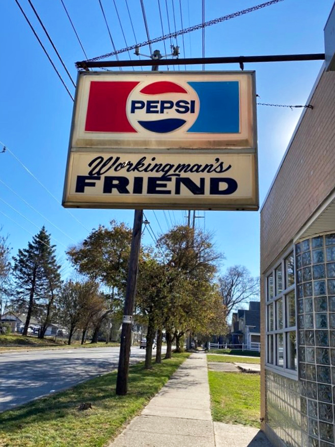 The vintage Pepsi sign stands as a landmark for hungry travelers. Like a North Star for those navigating by their stomachs.
