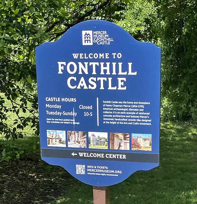 The blue welcome sign that answers the eternal question: "Is that really a castle in Pennsylvania?" with a resounding "Yes, and it's open Tuesday-Sunday."