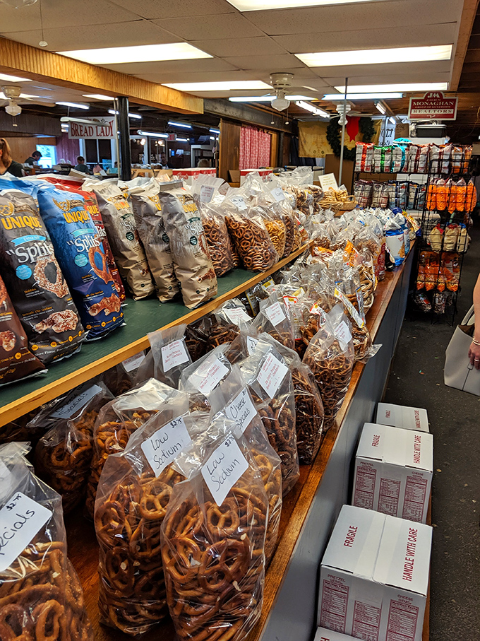 Pretzels, chips, and snacks galore line the shelves of the farmers market. Pennsylvania Dutch treats packaged with handwritten care.