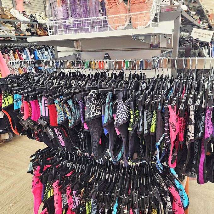 Activewear that's seen more Netflix than actual workouts finds new life here—colorful sports bras organized by size for easy browsing and budget-friendly fitness motivation.