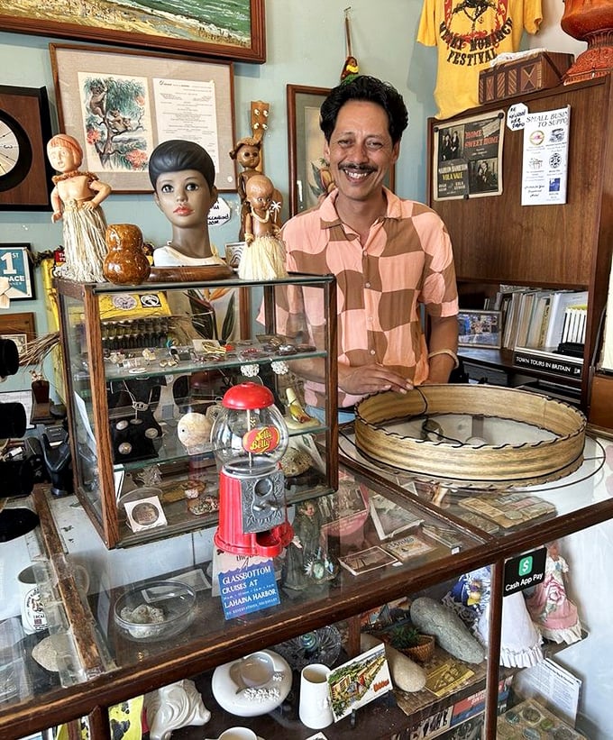 The shop's caretaker stands amid his carefully curated kingdom of curiosities, his smile suggesting he knows the story behind every single treasure.