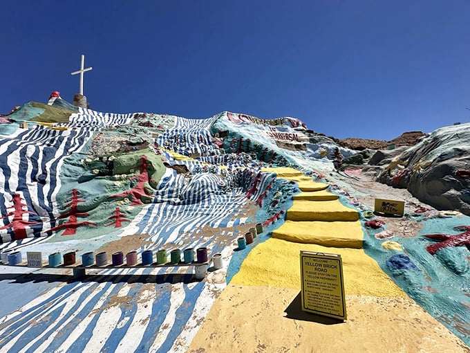 Follow the yellow brick road&mdash;desert edition. This stairway of sunshine leads pilgrims up the mountain, bordered by stripes that would make a zebra jealous. 