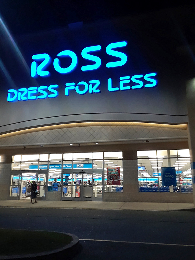 By night, the blue glow of Ross transforms into a beacon for last-minute shoppers and deal-seekers alike.