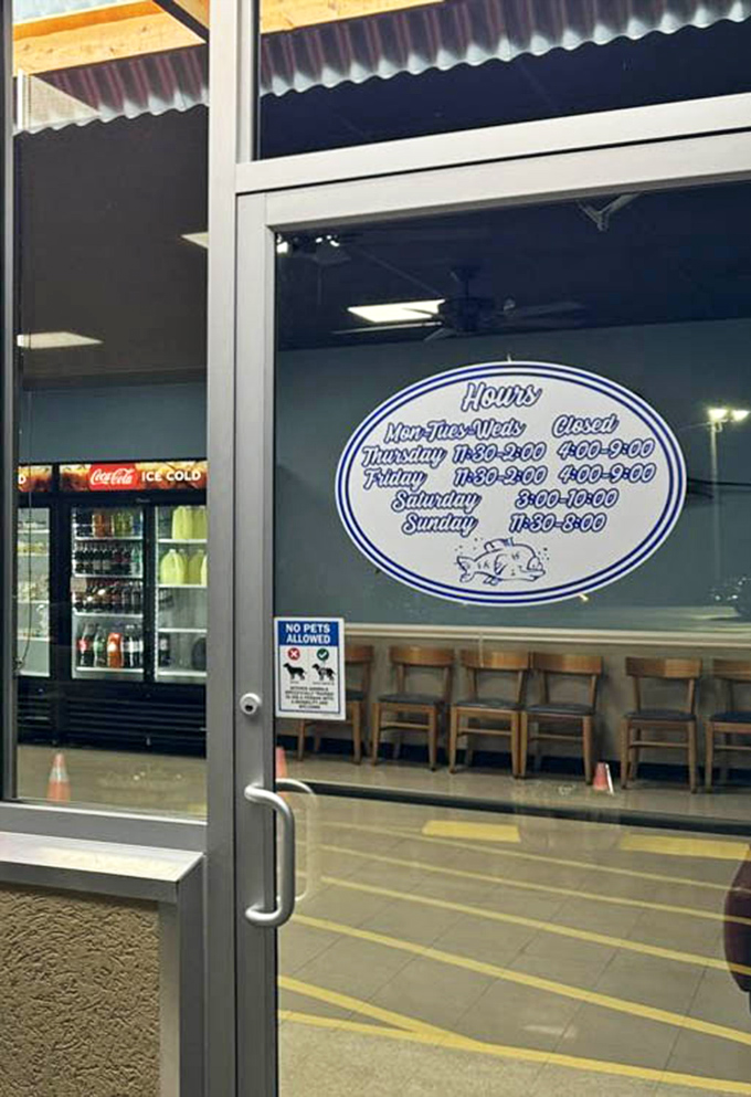 The hours of operation posted clearly&mdash;because knowing exactly when you can get your next hush puppy fix is essential information for planning your week.