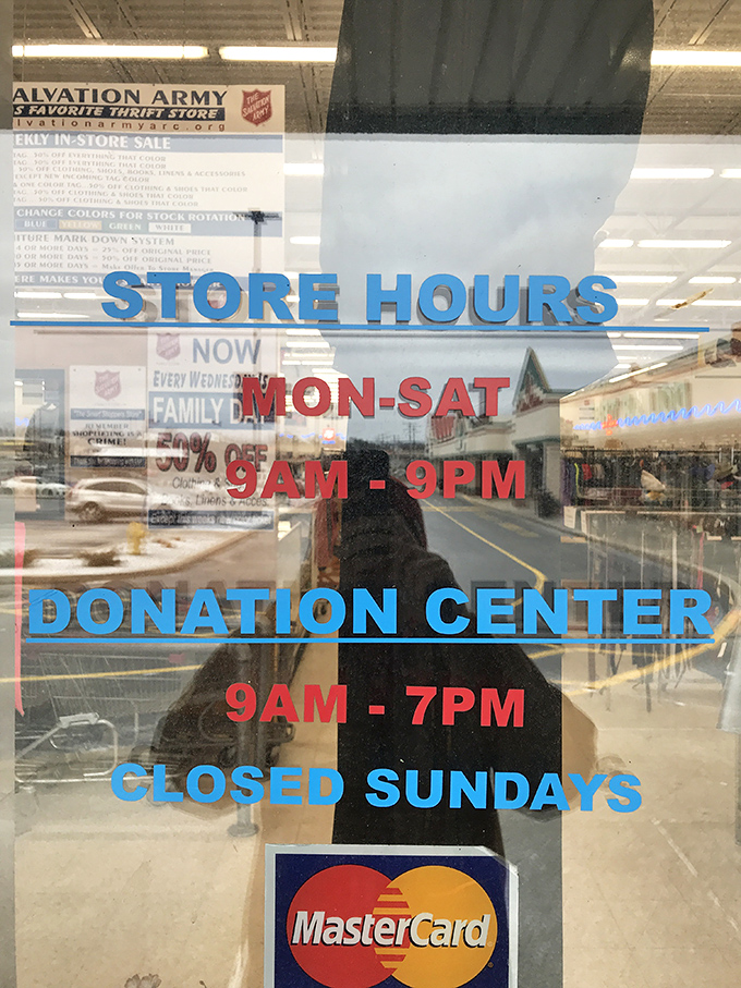 The store hours sign tells you when to hunt for treasures. Monday through Saturday, the thrift gods smile upon Harrisburg's bargain seekers.