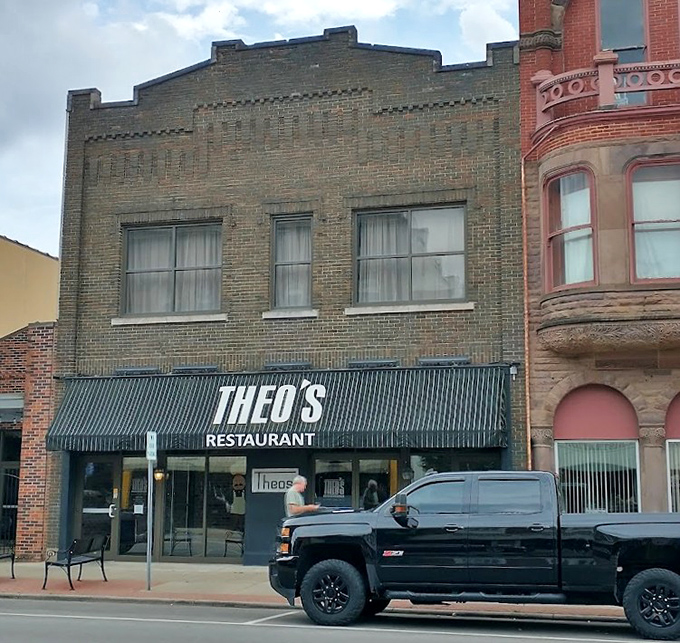 The historic building housing Theo's has witnessed decades of Cambridge history, serving as both restaurant and community gathering place.