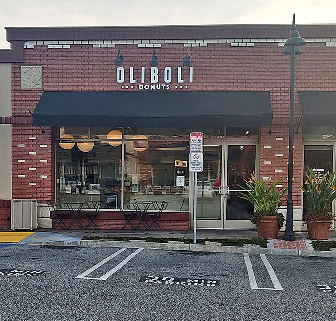 Morning light kisses the storefront, beckoning hungry souls to abandon all diet plans and surrender to sugary bliss.