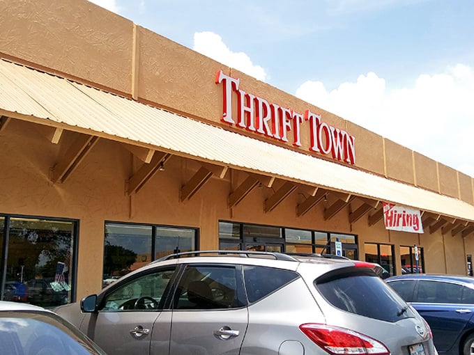 Thrift Town stands ready for another day of treasure-hunting, its "Hiring" sign a reminder that even thrift empires need helping hands.