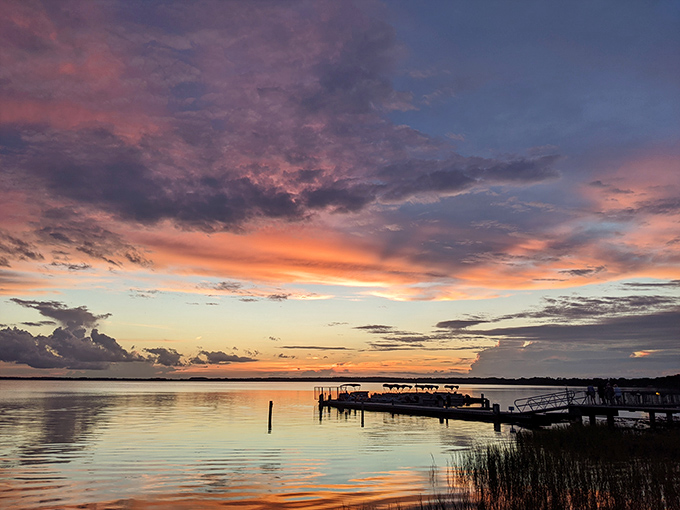 A Lake Eustis sunset paints the sky in colors so vivid, even the most jaded Floridian puts down their phone to watch.
