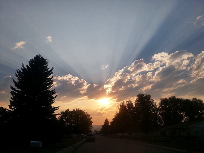 A South Dakota sunset puts on the kind of light show that makes you forget to check your phone for a solid twenty minutes.