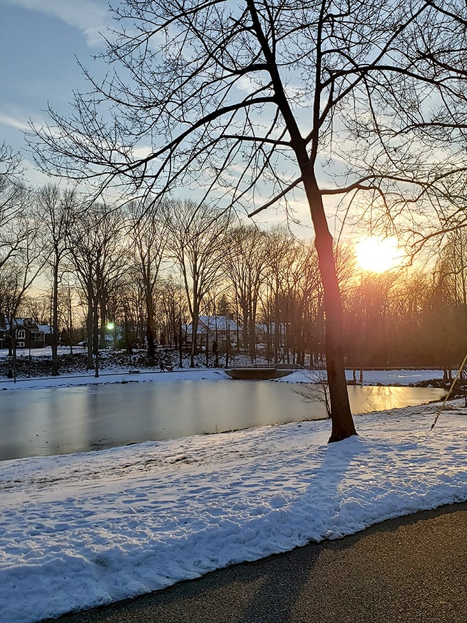 Sunset over frozen water paints the kind of scene that makes commutes and mortgages feel worthwhile again.