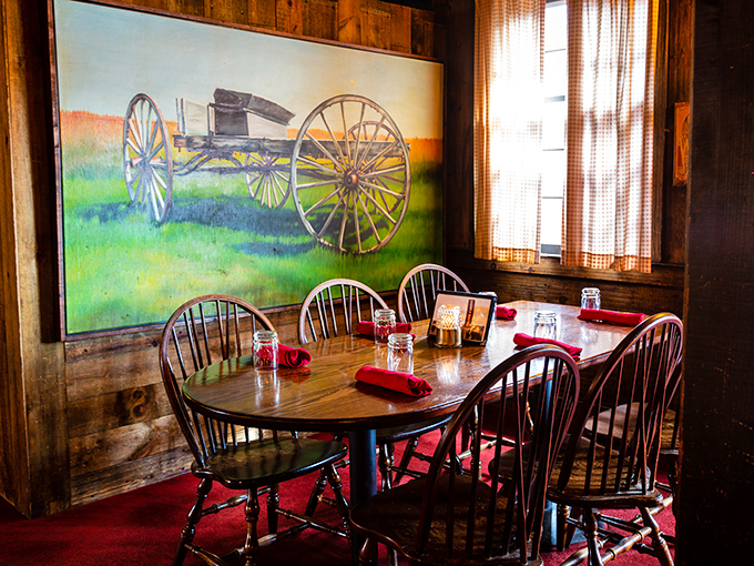 A private dining nook where the rustic charm is cranked to eleven, complete with Windsor chairs that have witnessed countless celebrations.